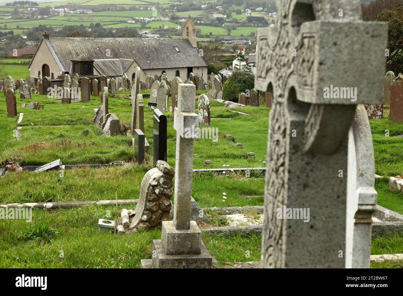 Kirk Maughold Church and graveyard, Maughold, Isle of Man Stock Photo ...