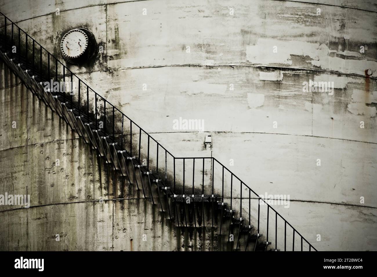 Staircase on side of industrial tank Stock Photo - Alamy