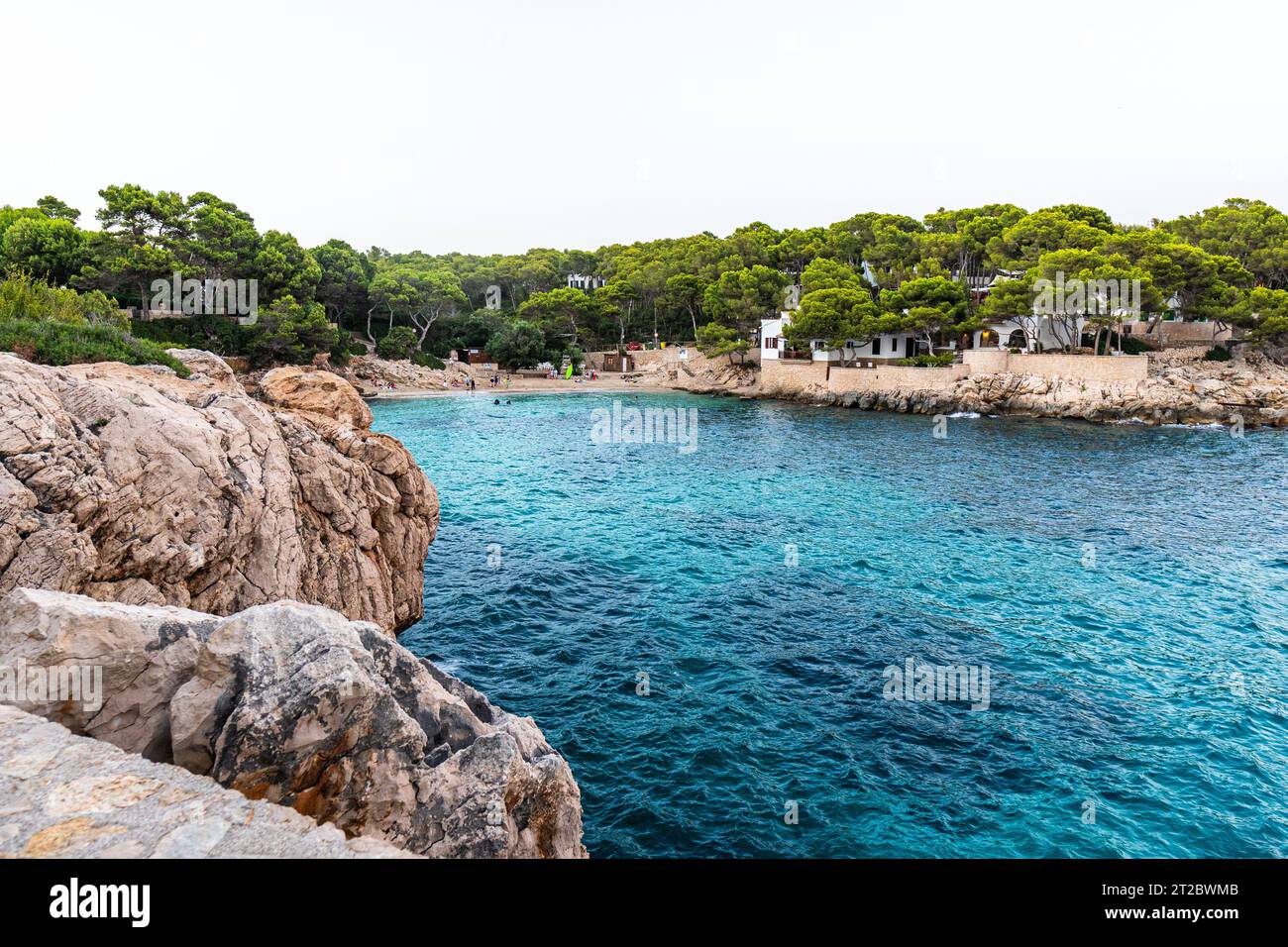 the beautiful cala gat bay and beach with turquoise water of the ...