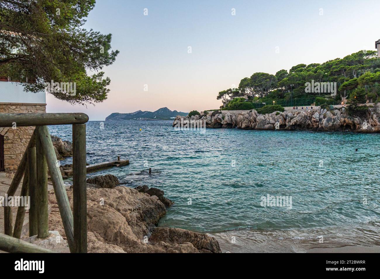 the beautiful cala gat bay and beach with turquoise water of the ...