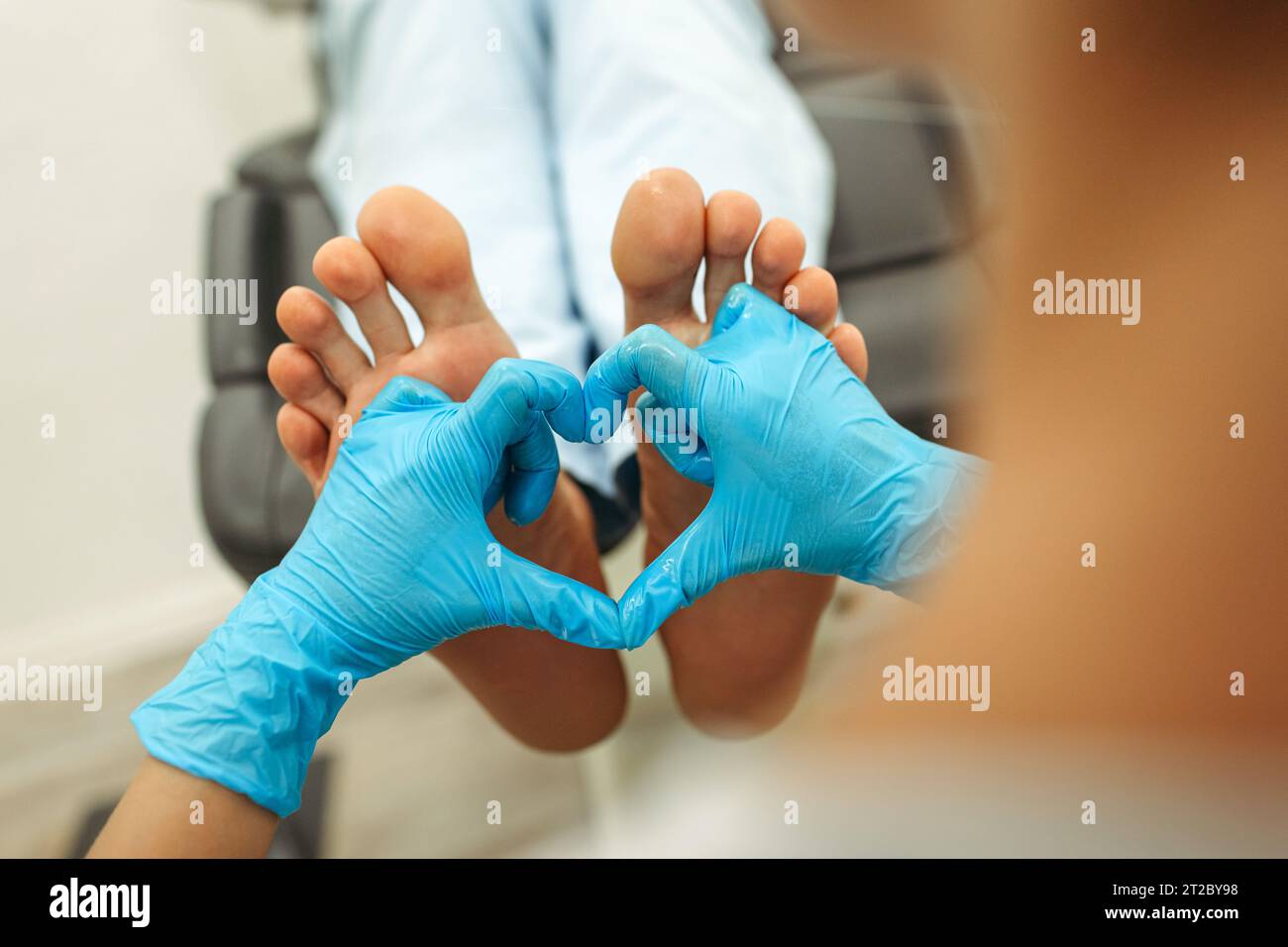 the doctor shows the heart with his hands. Hand gesture. Heart shape ...