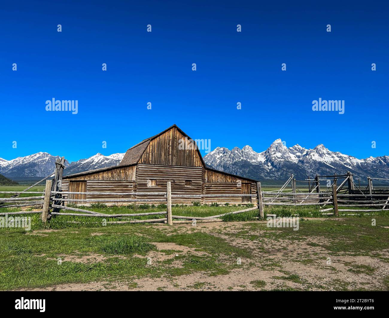 Jackson Hole, WY USA - June 5, 2023: A barn with the Teton Mountain ...