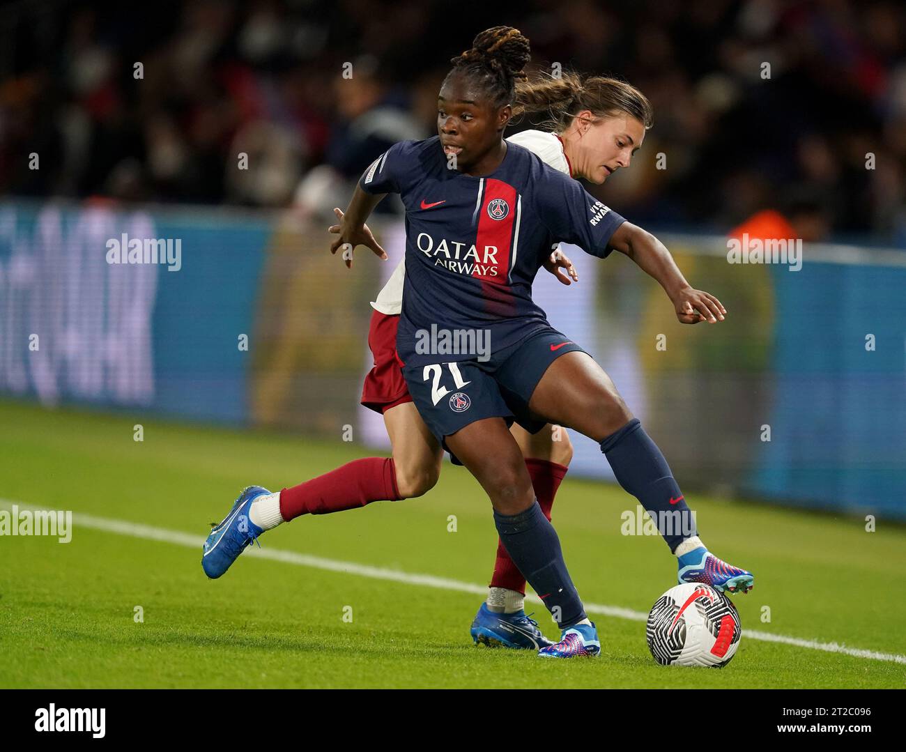 Paris Saint-Germain's Sandy Baltimore (front) and Manchester United's ...