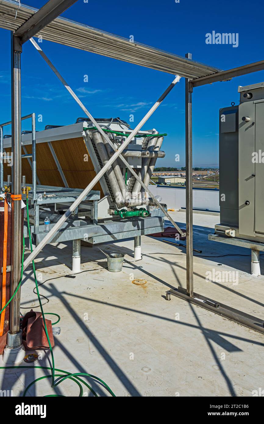 One end of an adiabatic condenser on the roof at a CO2 cold-storage ...