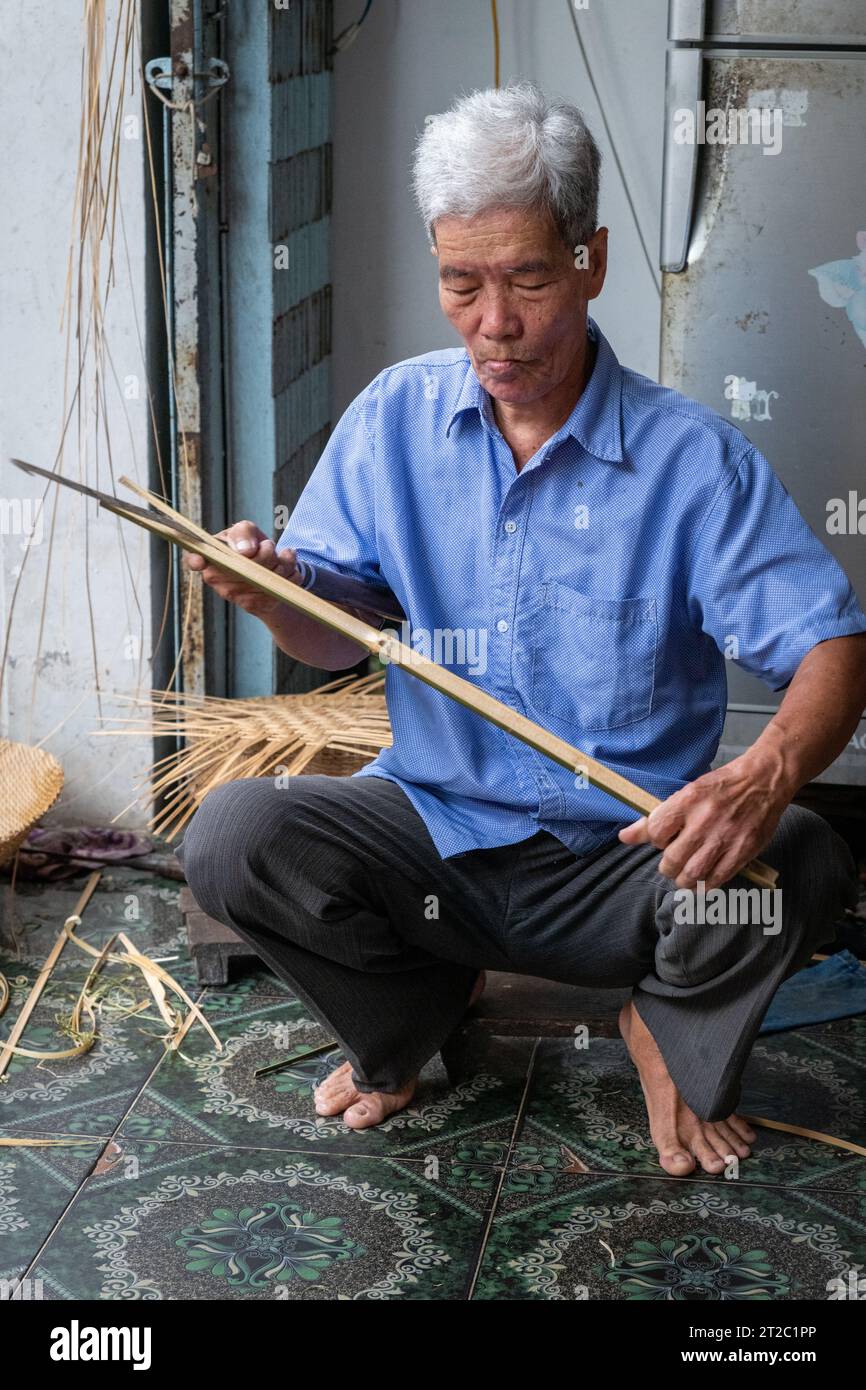 Splitting Bamboo for Weaving Baskets, Mekong Delta, Vietnam Stock Photo ...