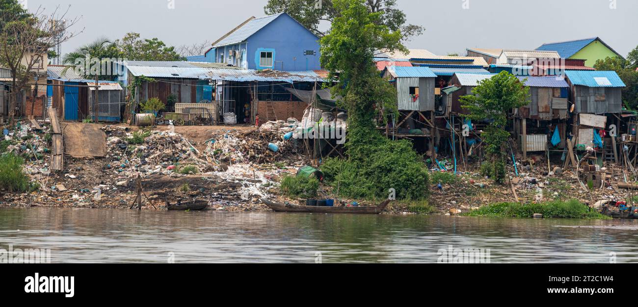 Poor Riverside Village with Rubbish and Pollution, Cambodia Stock Photo ...