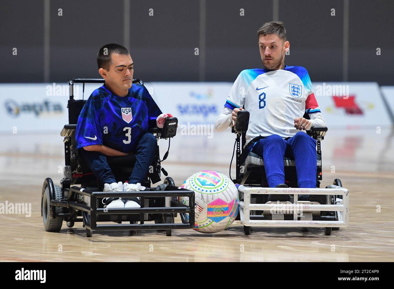 Jordan Dickey (L) of the United States of America powerchair football ...