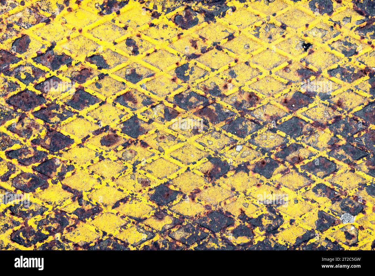 Corroded metal background. Rusted yellow painted metal plate. The metal ...