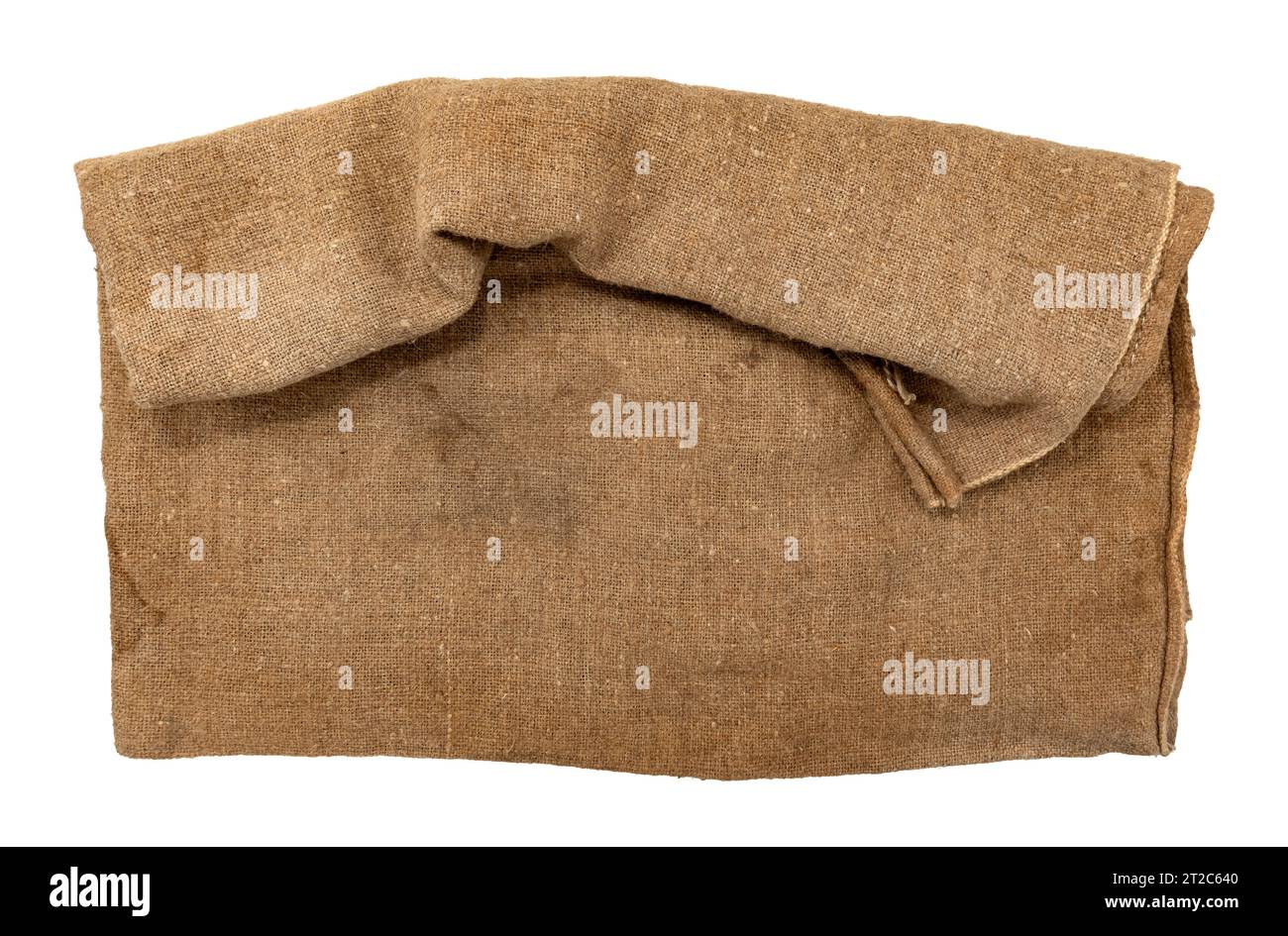 Burlap texture. A piece of torn burlap on a white background. Canvas ...
