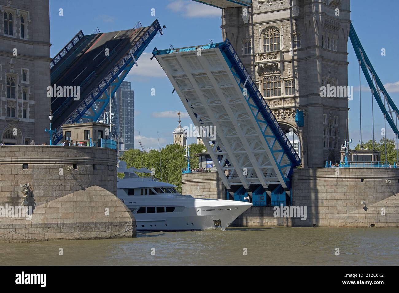 Motoryacht Kathleen Anne on the River Thames passing under Tower Bridge ...