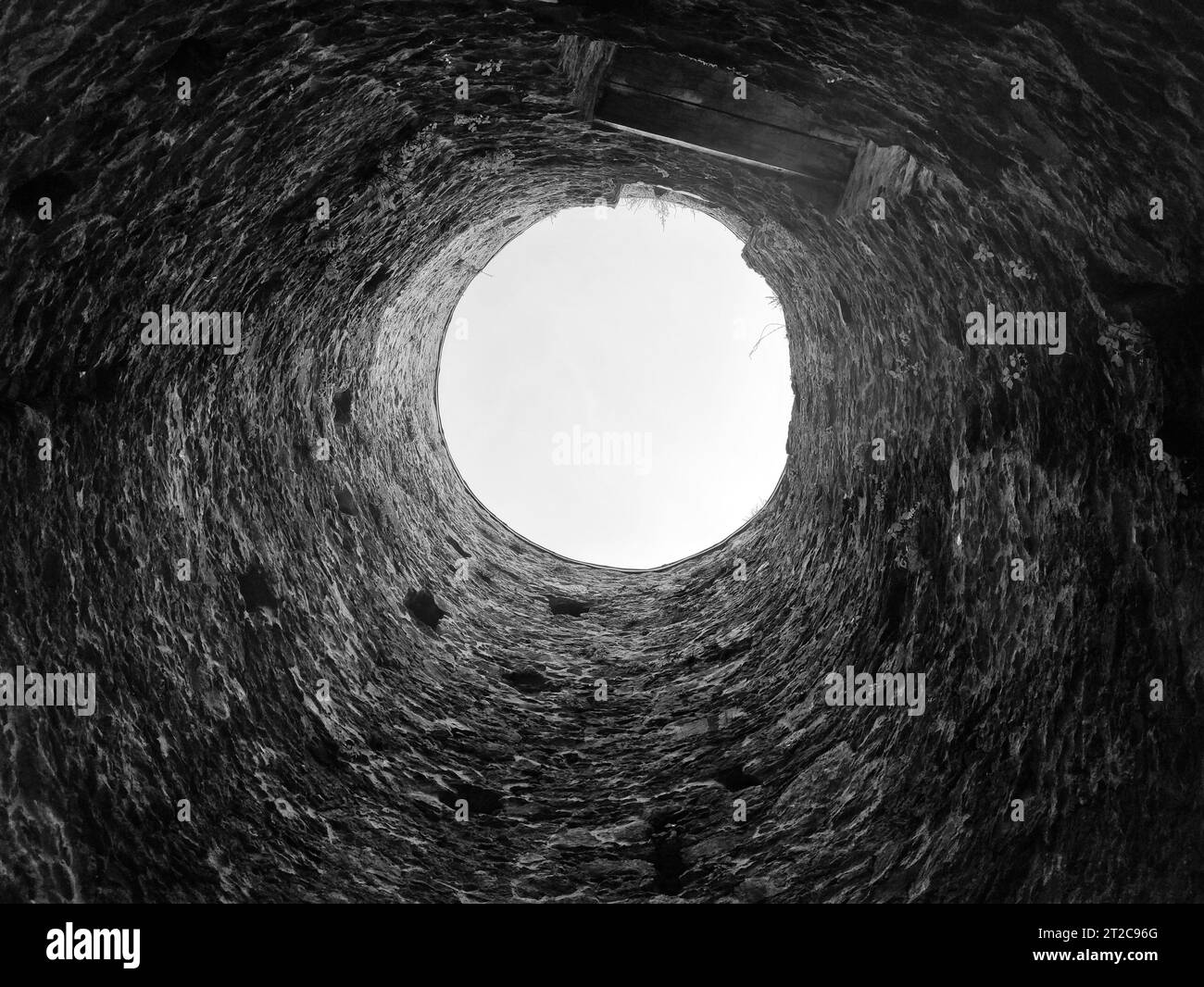 Stone well hole, old construction from inside, fall down in the well ...