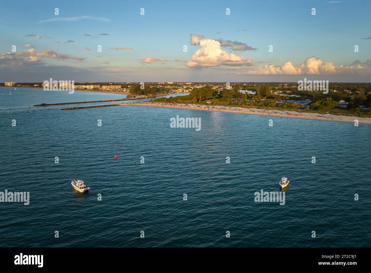 Aerial view of sea shore near Venice, Florida with white yachts at ...