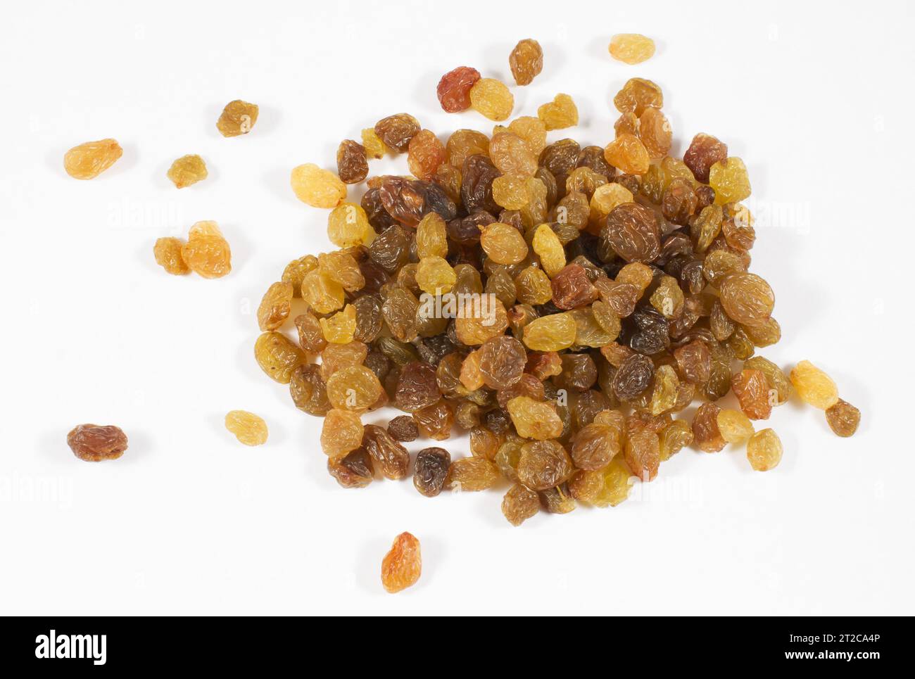 Dried raisins of different size on a white background Stock Photo - Alamy