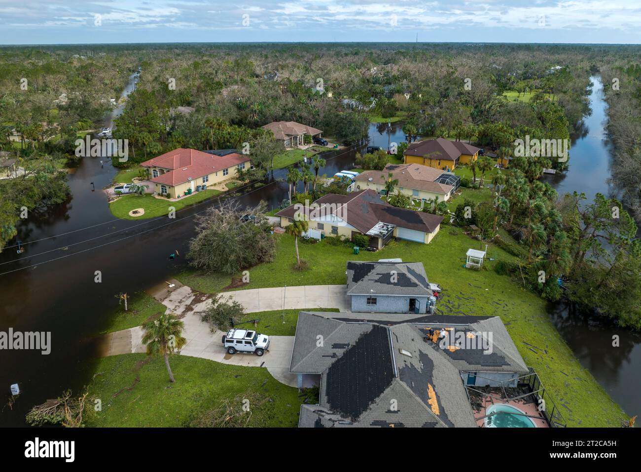 Aftermath of natural disaster. Surrounded by hurricane Ian rainfall ...
