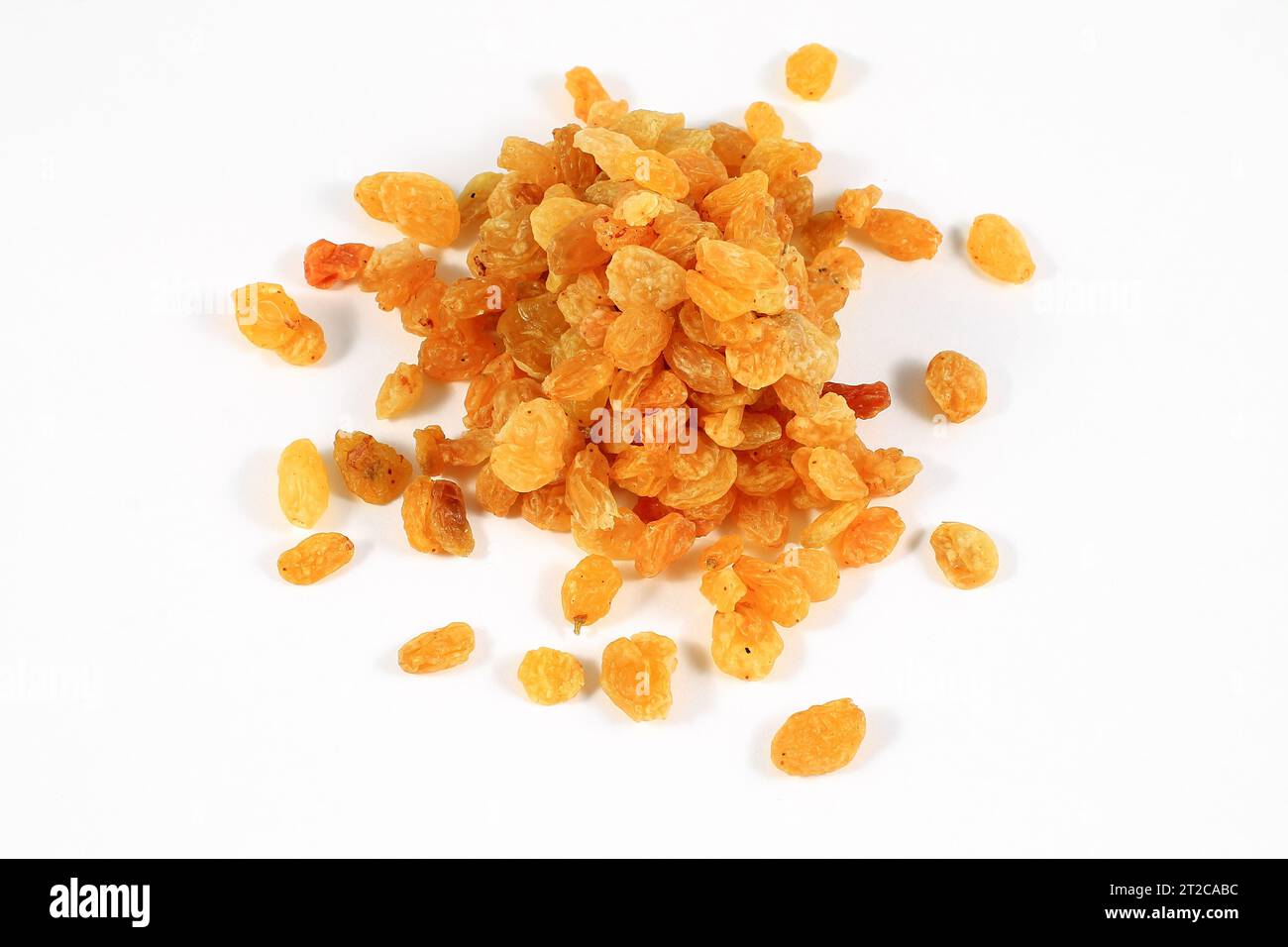Dried raisins of different size on a white background Stock Photo - Alamy