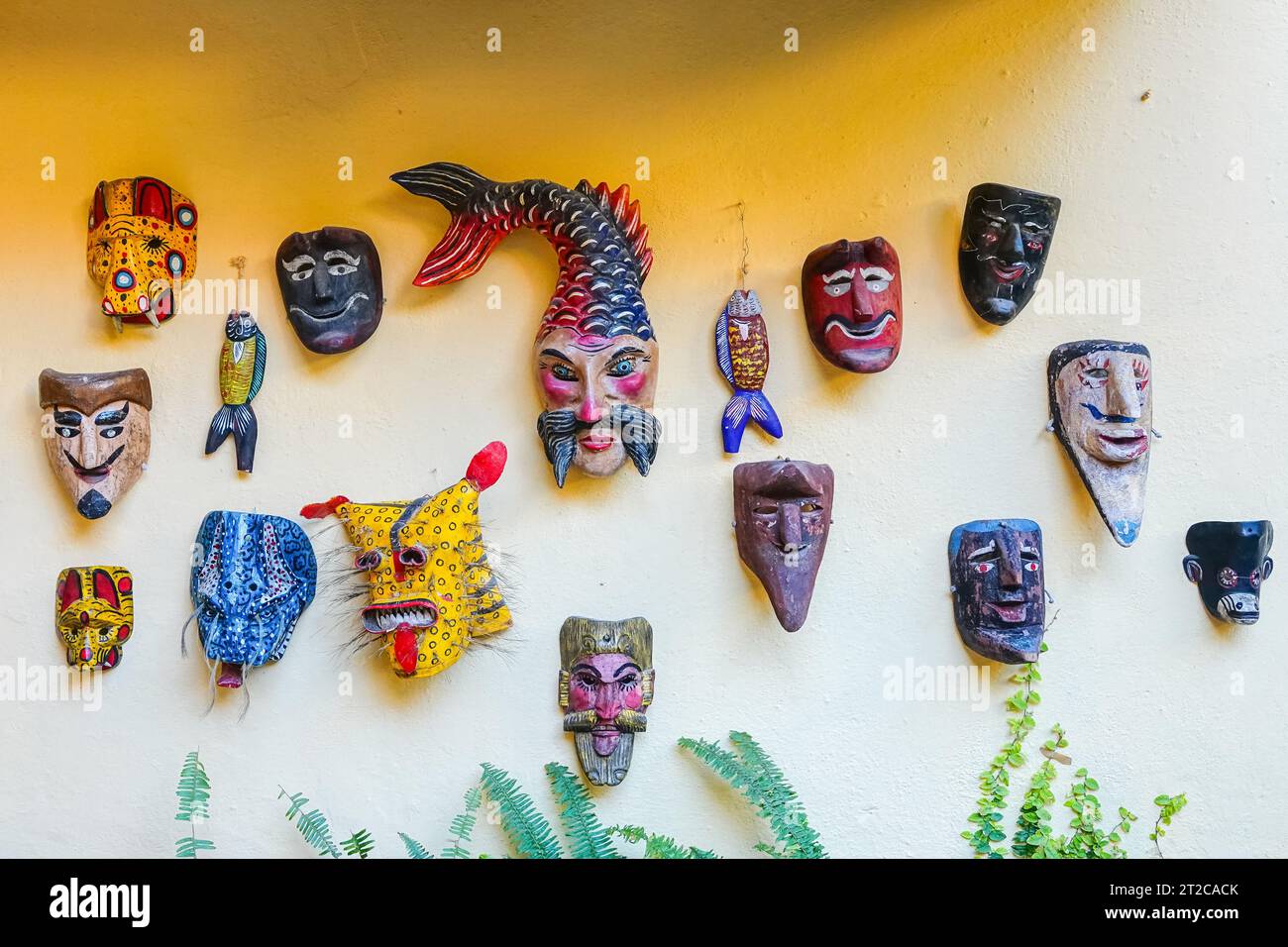 A display of colorful of Mexican folk masks inside the Hacienda El ...
