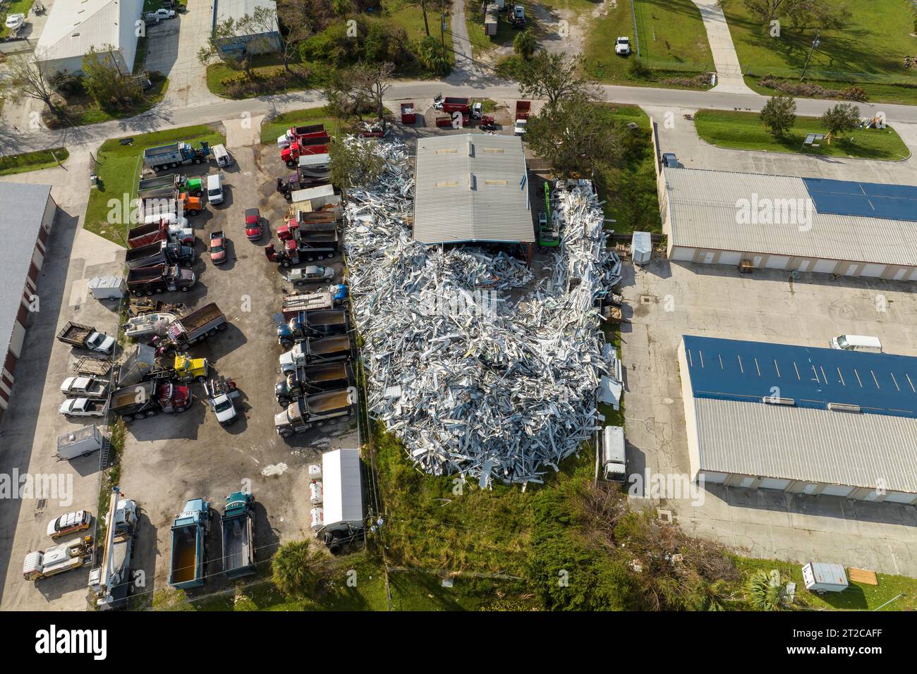 Beg pile of scrap aluminum metal siding from ruined houses after ...