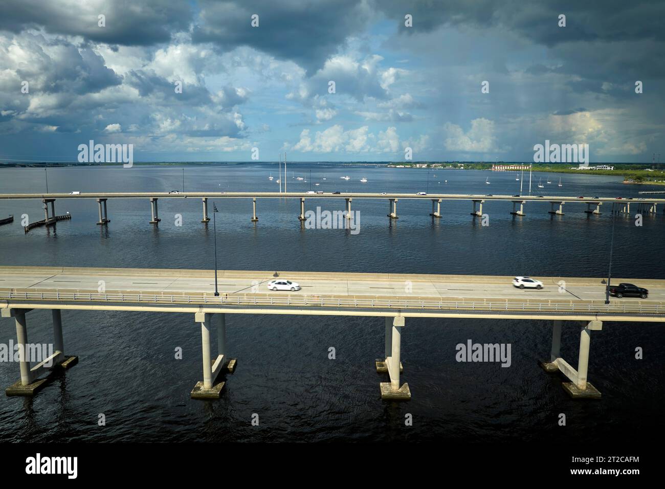 Barron Collier Bridge and Gilchrist Bridge in Florida with moving ...