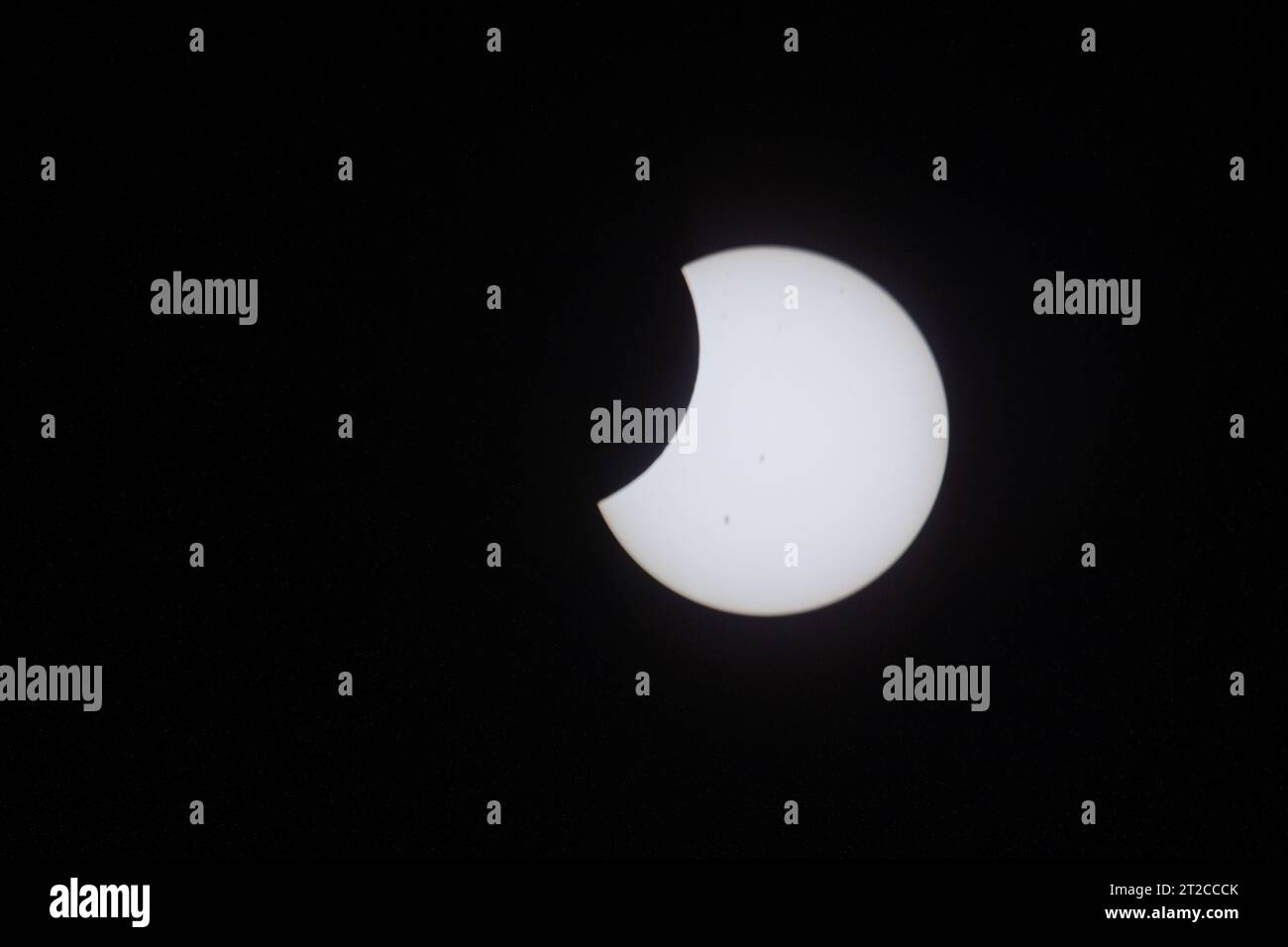 Earth Atmosphere. 14th Oct, 2023. The Moon passes in front of the Sun ...