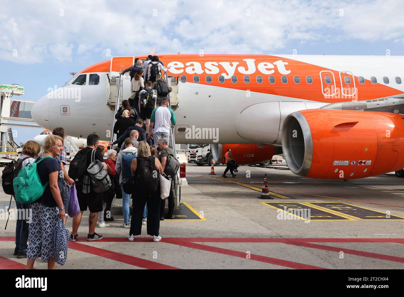 Passengers boarding an easyJet Airbus at Falcone-Borsellino airport in ...