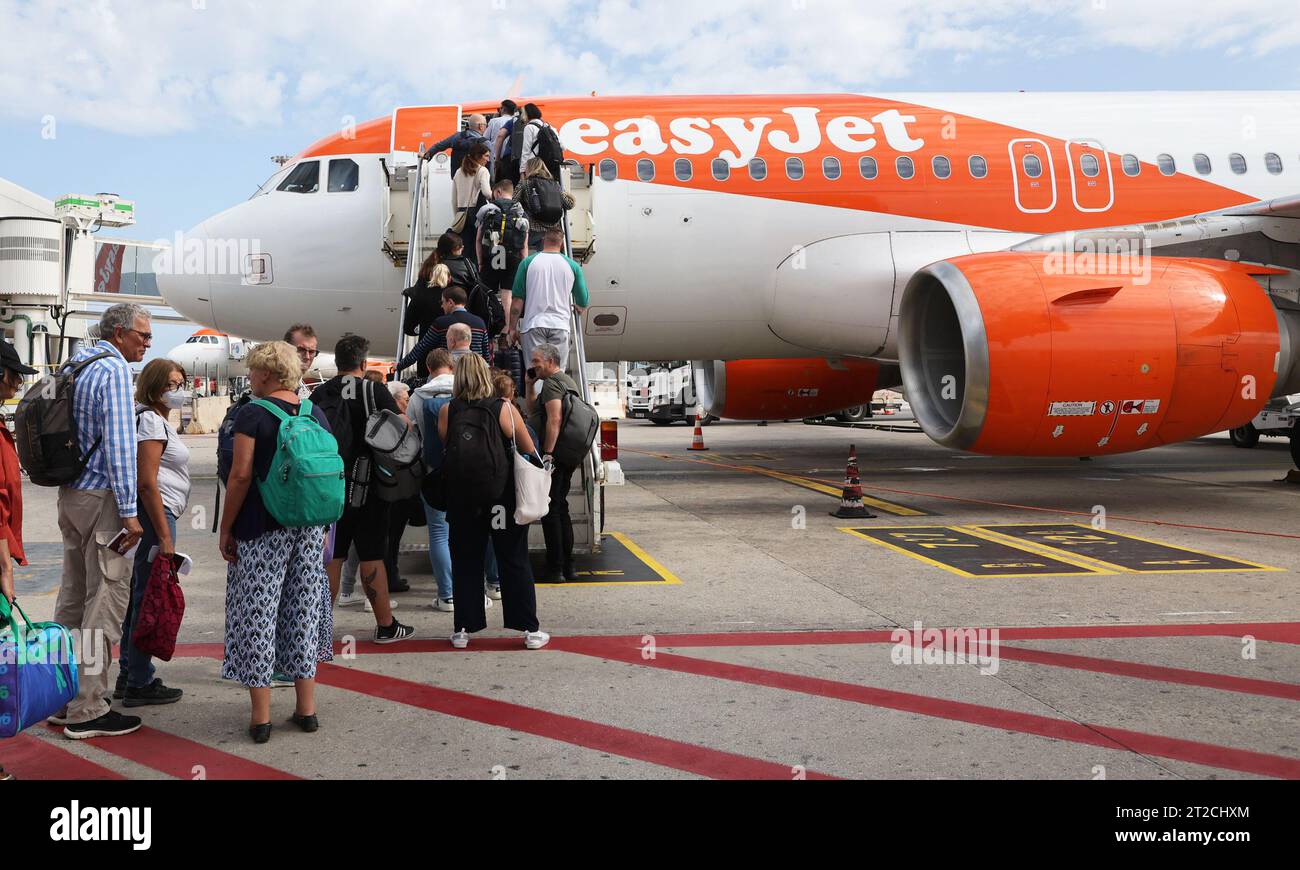 Passengers boarding an easyJet Airbus at Falcone-Borsellino airport in ...