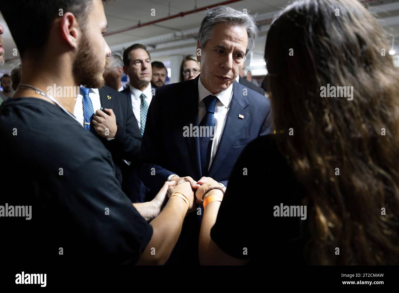 Secretary of State Antony J. Blinken embraces Lior Gelbaum, right, 24 ...