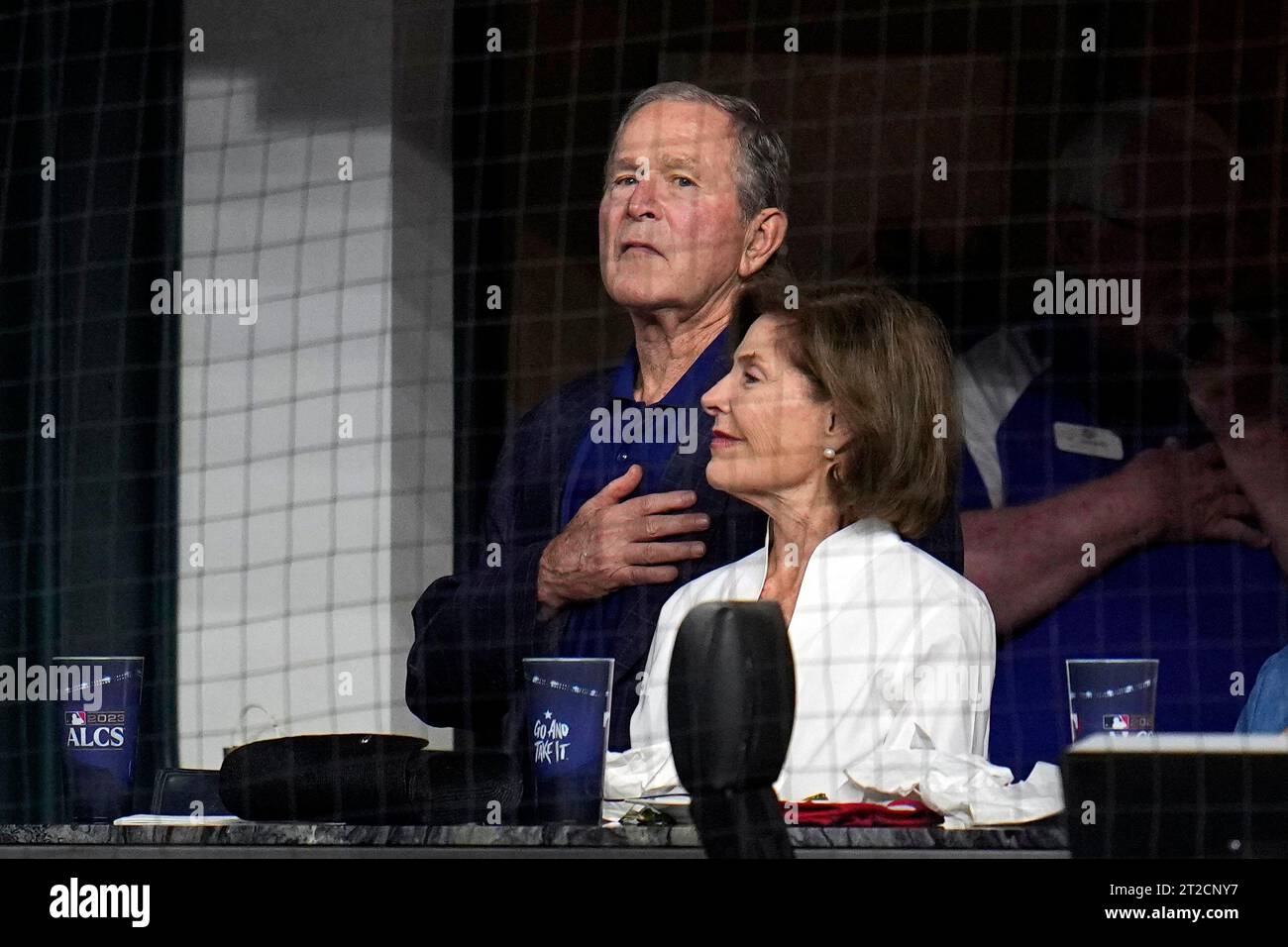 Former President George W. Bush and wife Laura watch before Game 3 of ...