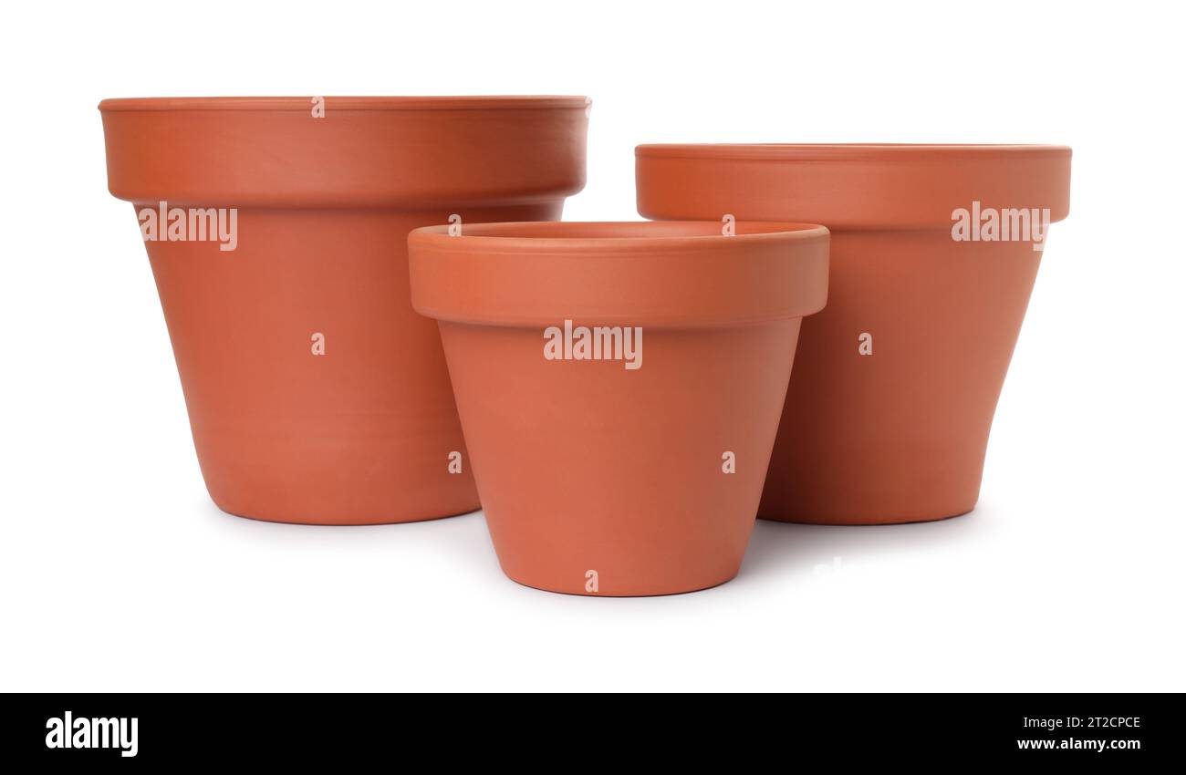 Empty clay flower pots isolated on white Stock Photo - Alamy