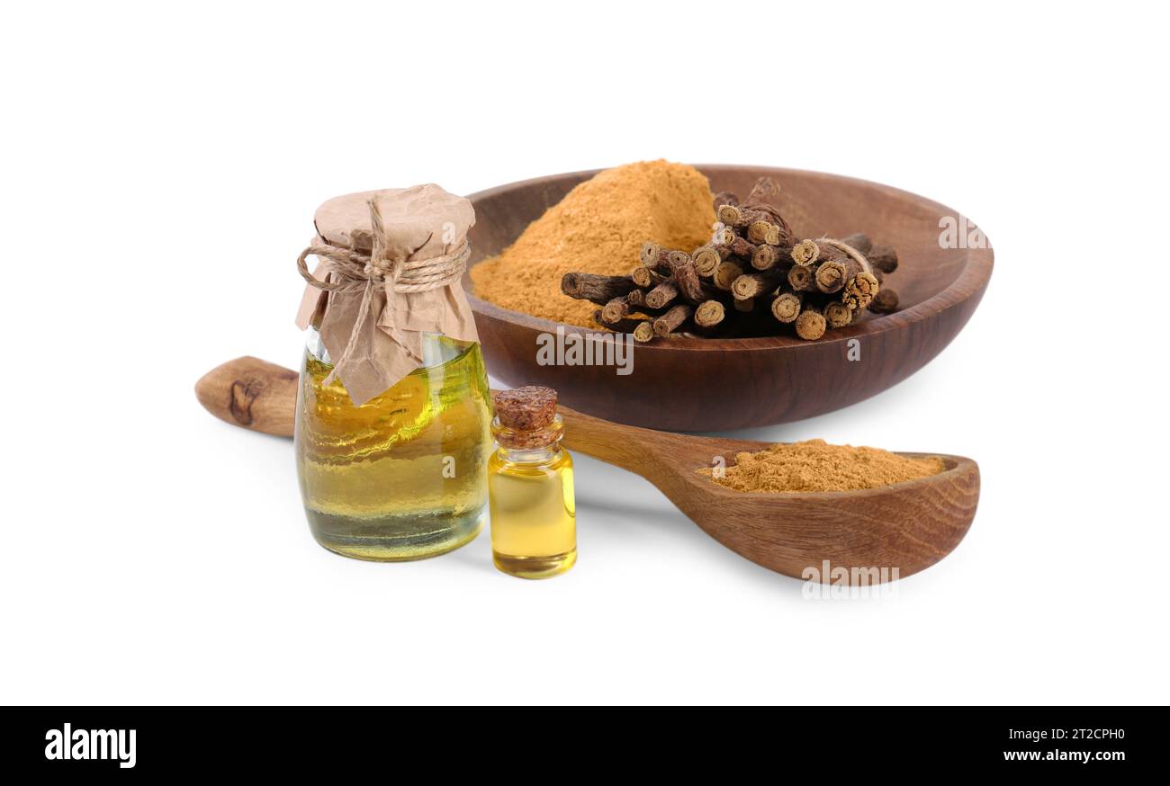 Dried sticks of licorice root, powder and essential oil isolated on ...