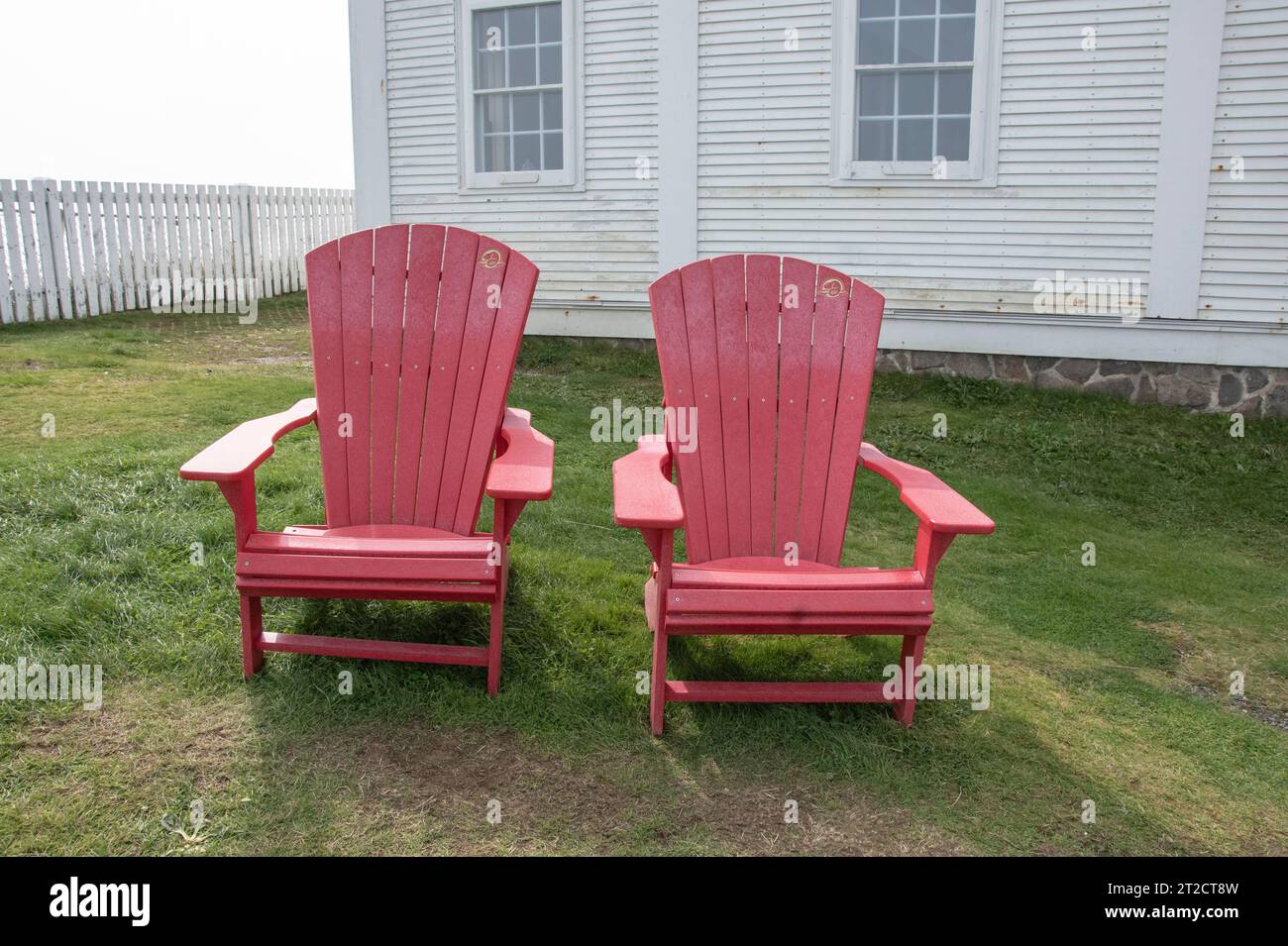 Red Adirondack chairs at Cape Spear Lighthouse National Historic Site ...