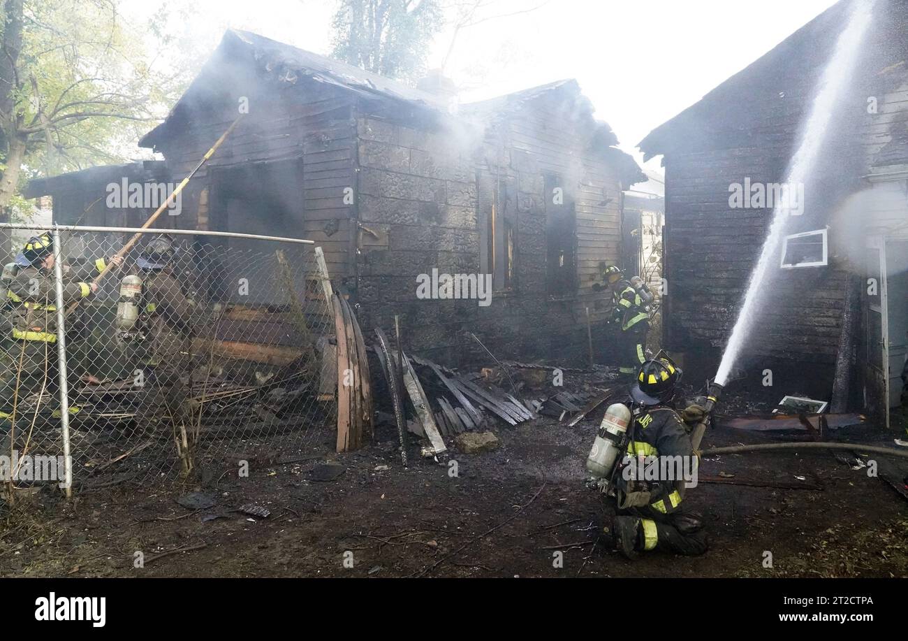 St. Louis, United States. 18th Oct, 2023. St. Louis firefighters use ...