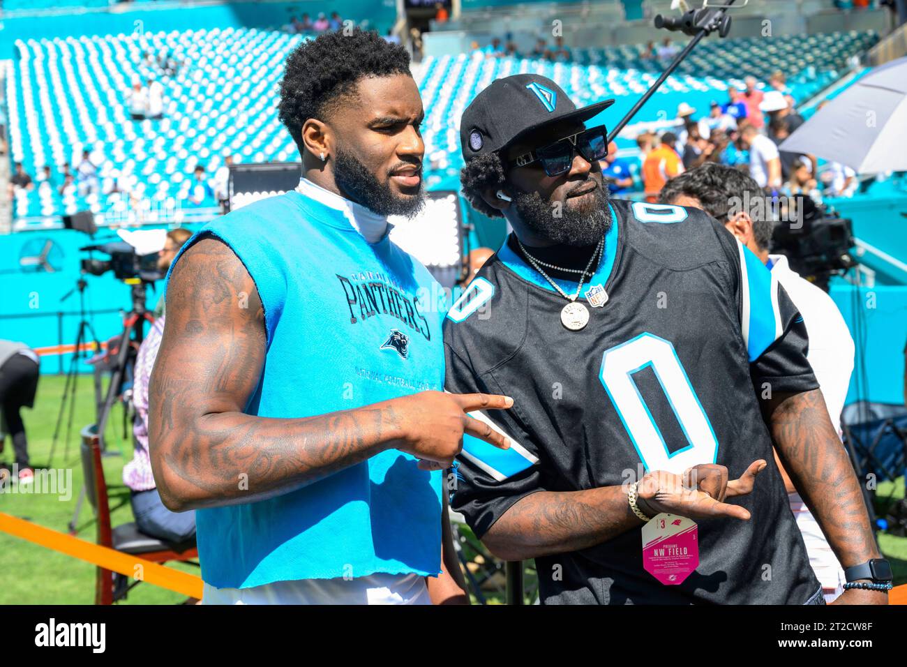 Carolina Panthers linebacker Brian Burns (left) poses with his brother ...