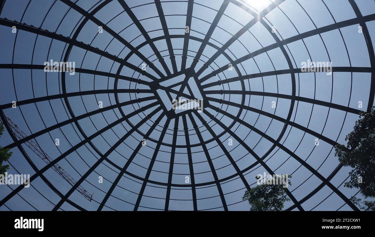 view inside a large aviary dome with curved steel in the form of dome ...