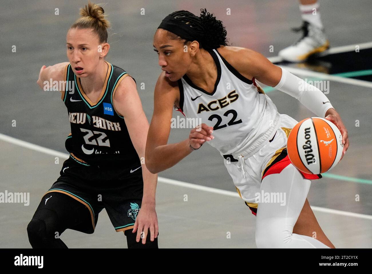 Las Vegas Aces' A'ja Wilson, right, drives past New York Liberty's ...