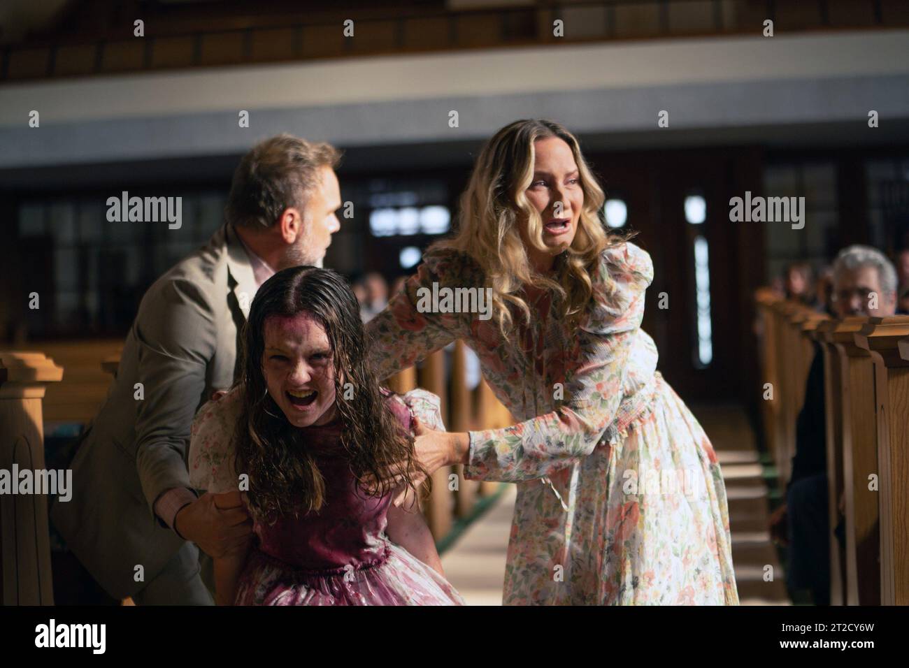 THE EXORCIST: BELIEVER, from left: Norbert Leo Butz, Olivia O'Neill ...
