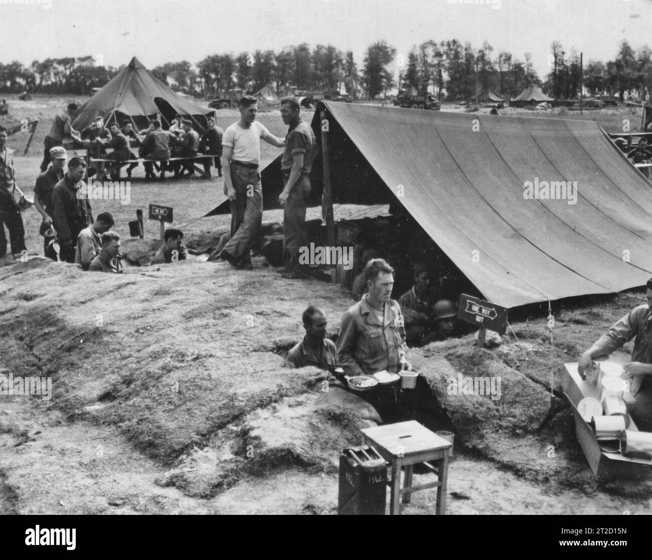 FOXHOLE KITCHEN-As protection against strafing by the Luftwaffe, this ...