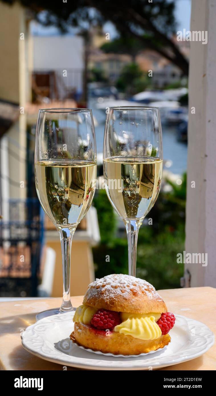 Drinking of French brut champagne sparkling wine with cake Tarte ...