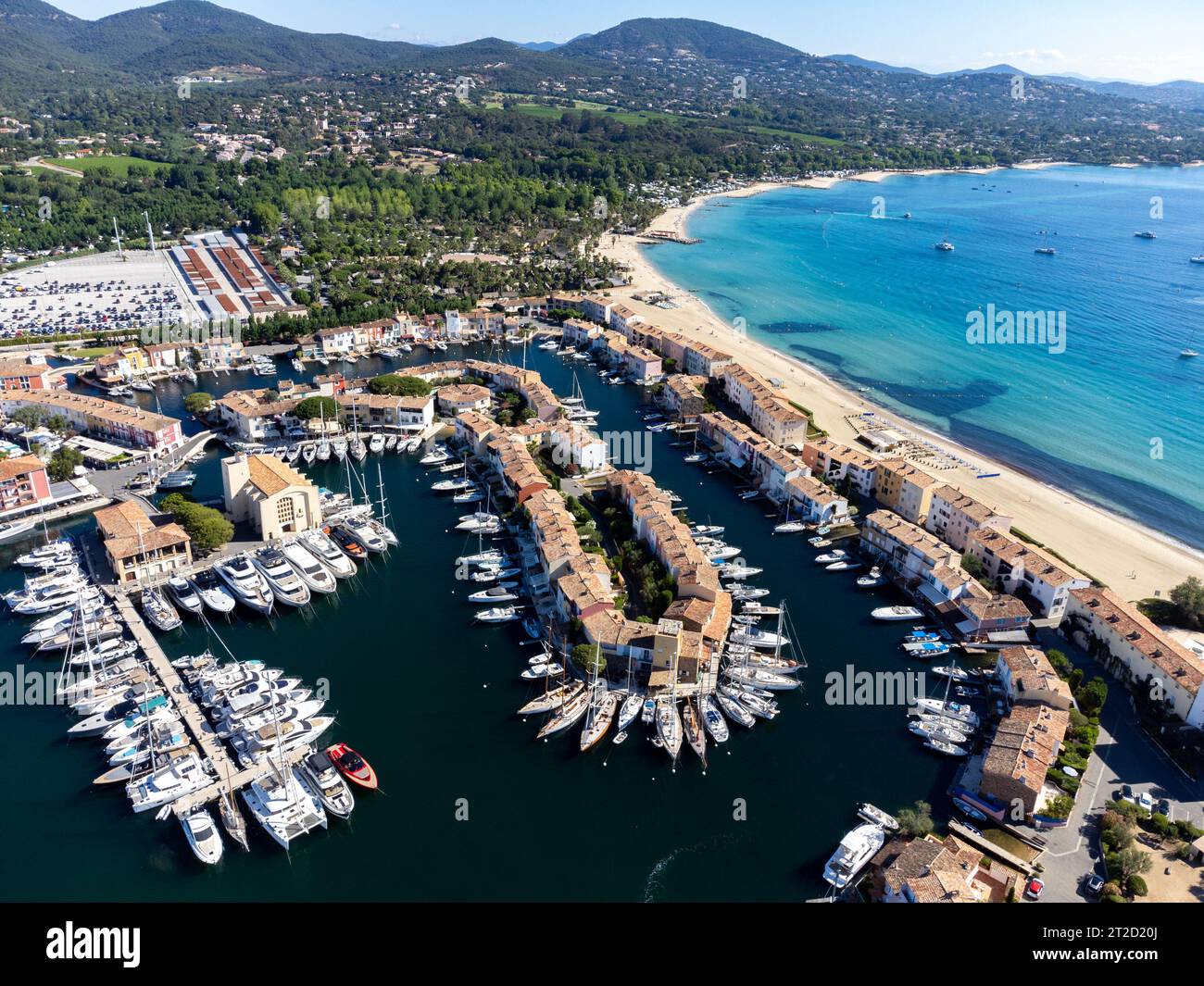 Arial view on blue water of Gulf of Saint-Tropez, boats, houses in Port ...
