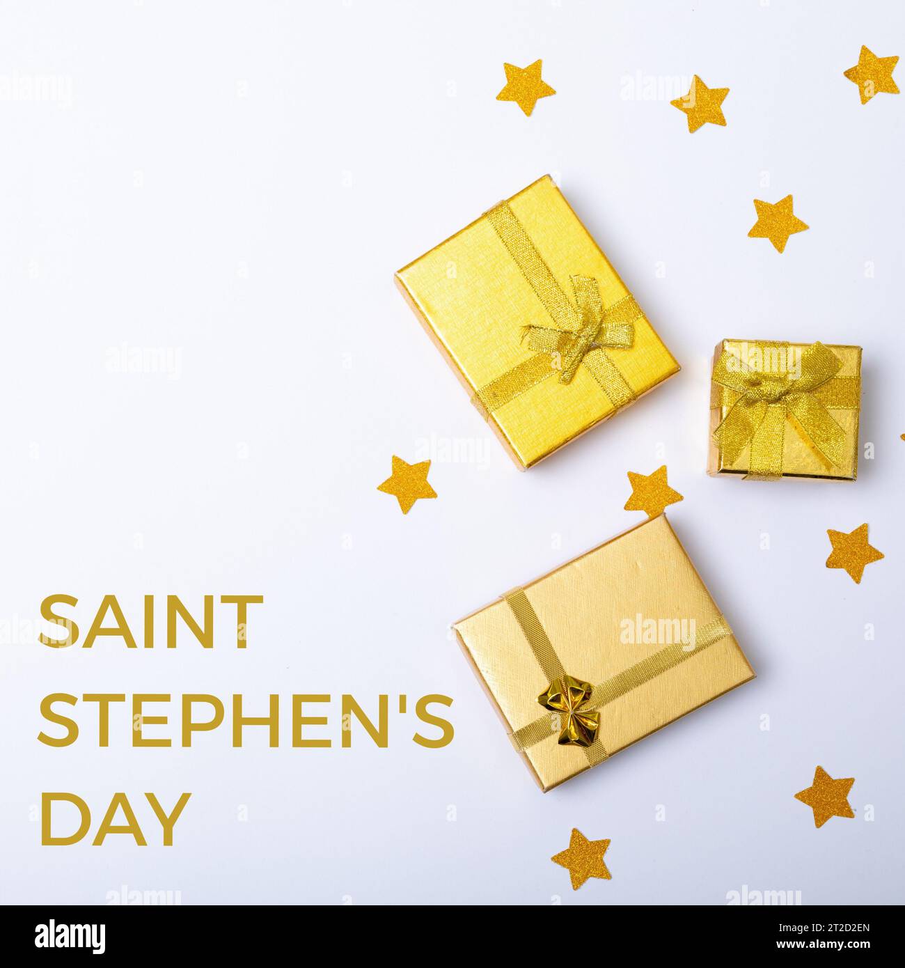 Composite of saint stephen's day text and golden christmas gifts and ...
