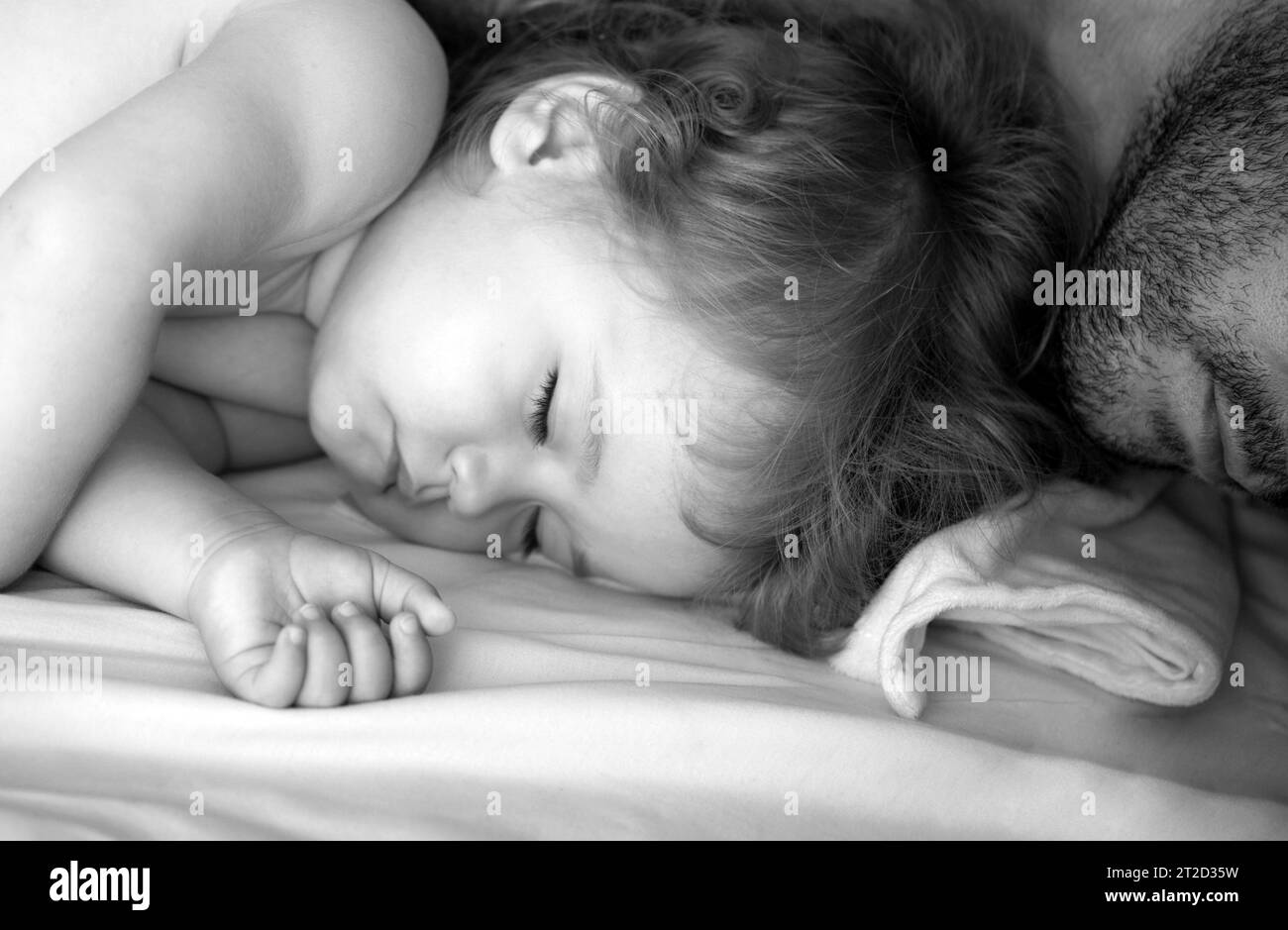 Father and child sleeping in the bed. Morning family sleep Stock Photo ...