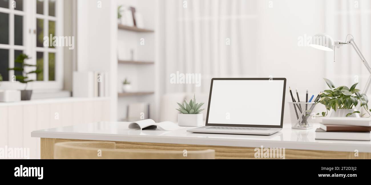 A white-screen laptop mockup and accessories on a white tabletop in a ...