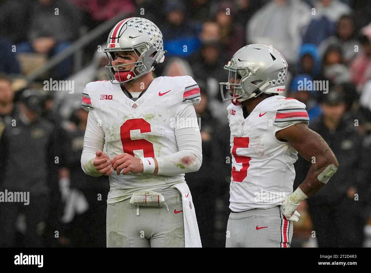 Ohio State quarterback Kyle McCord (6) and running back Dallan Hayden ...