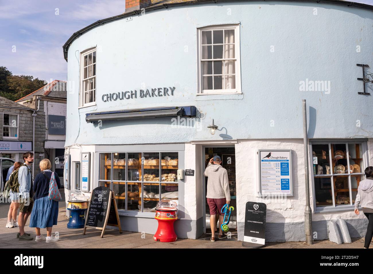 Padstow town centre Chough Bakery with customers ordering bread rolls ...