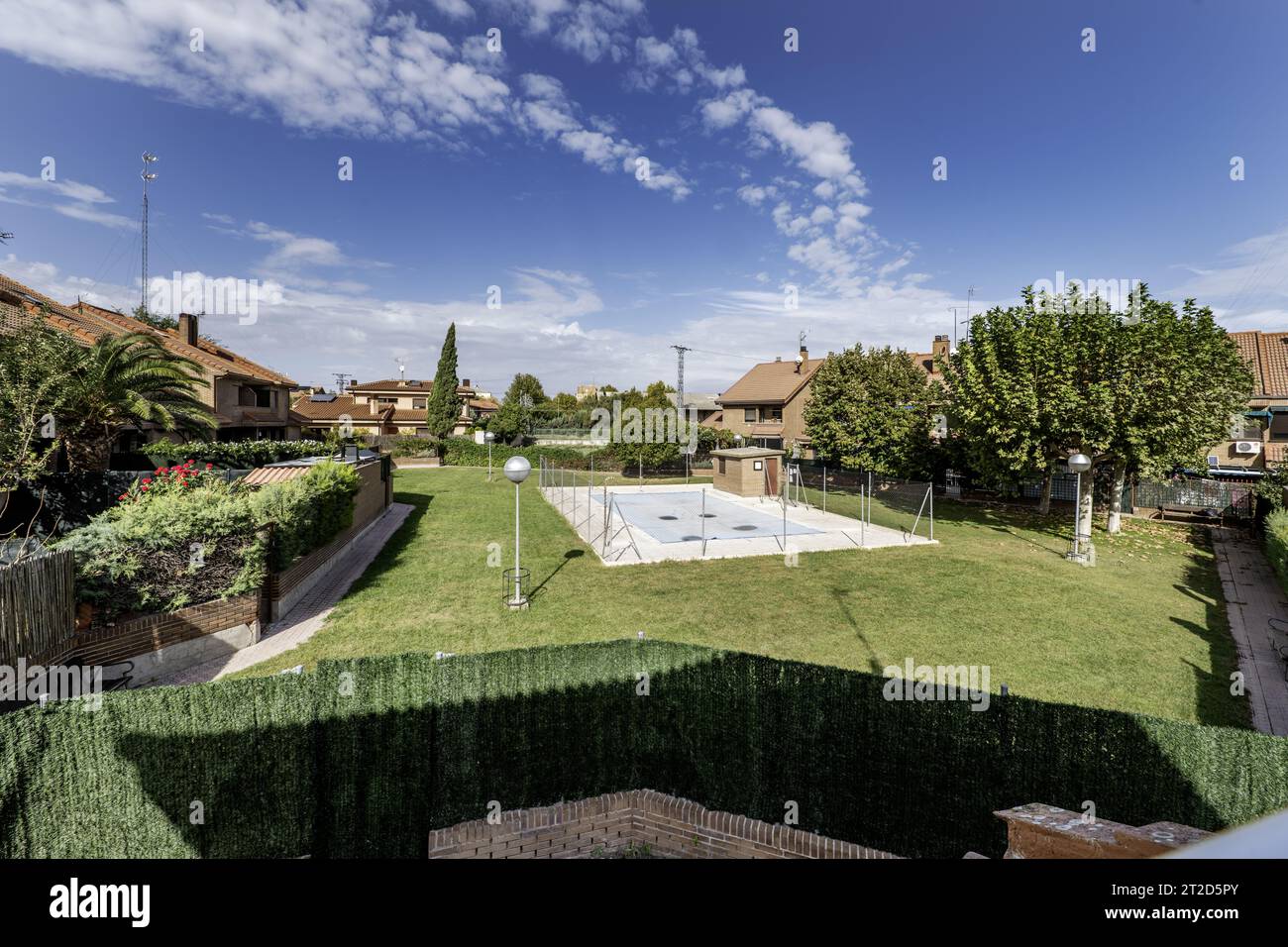 Community plot in an urbanization of single-family houses with a summer ...