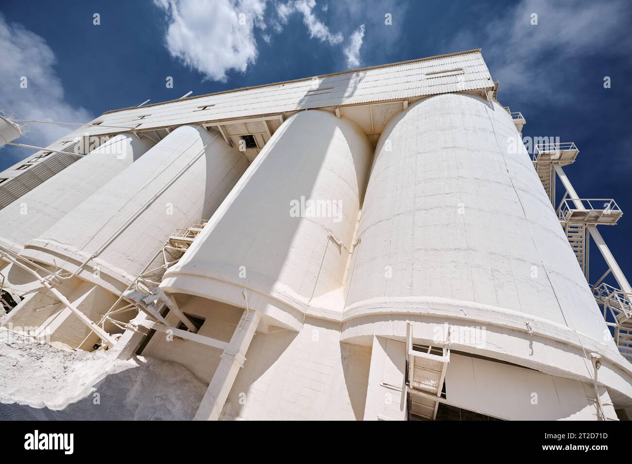 Concrete silos for storage of limestone products at plant Stock Photo ...