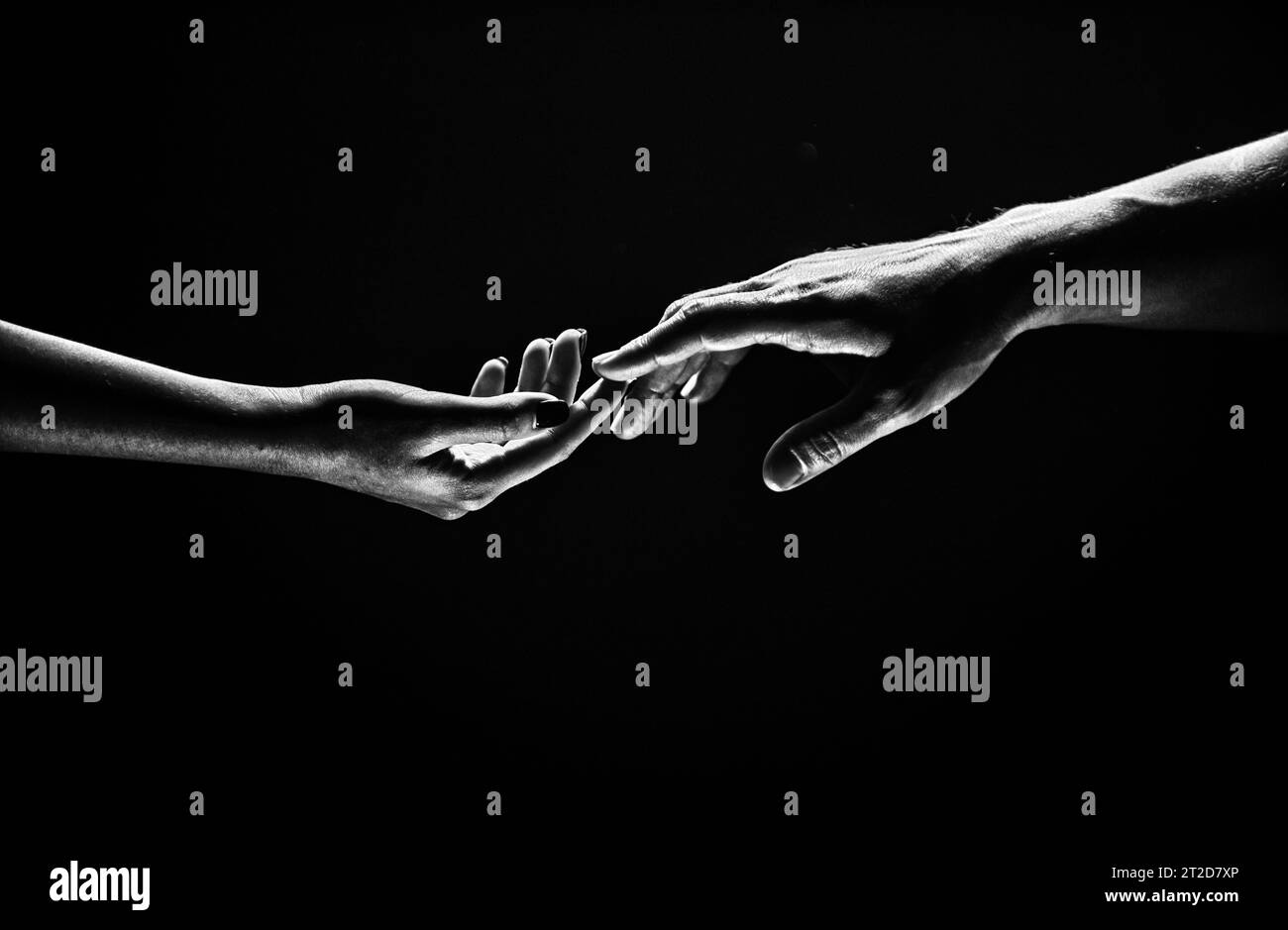 Romantic touch with fingers, love. Two hands stretch each other, black ...