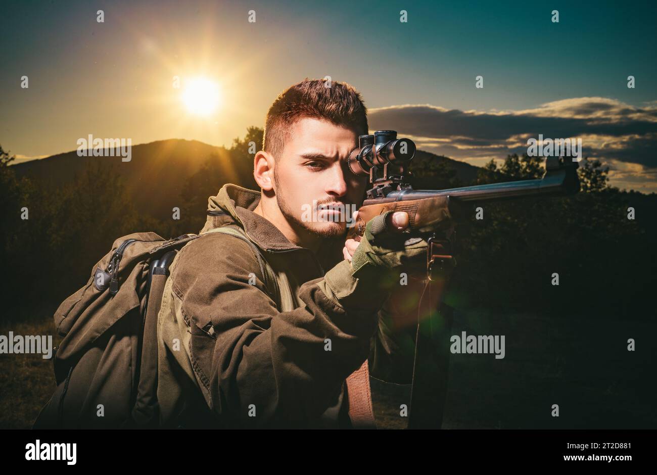 Close up snipers carbine at the outdoor hunting. Hunter aiming rifle in ...