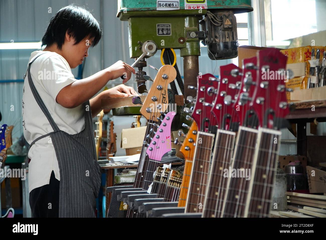Manufacturing musical instruments hi-res stock photography and images ...