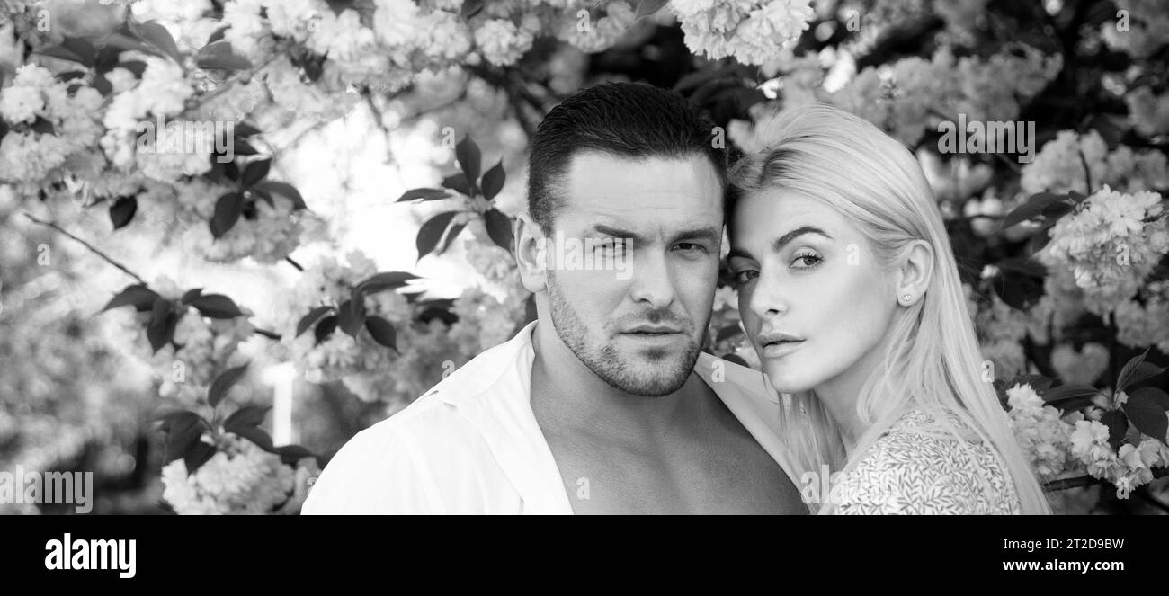 Spring couple in love, banner. Spring couple in love walking in sakura ...