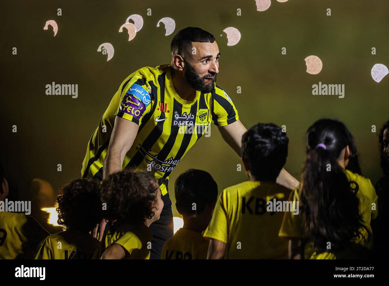 File photo - French football player Karim Benzema is presented to Al-Ittihad fans at King ...